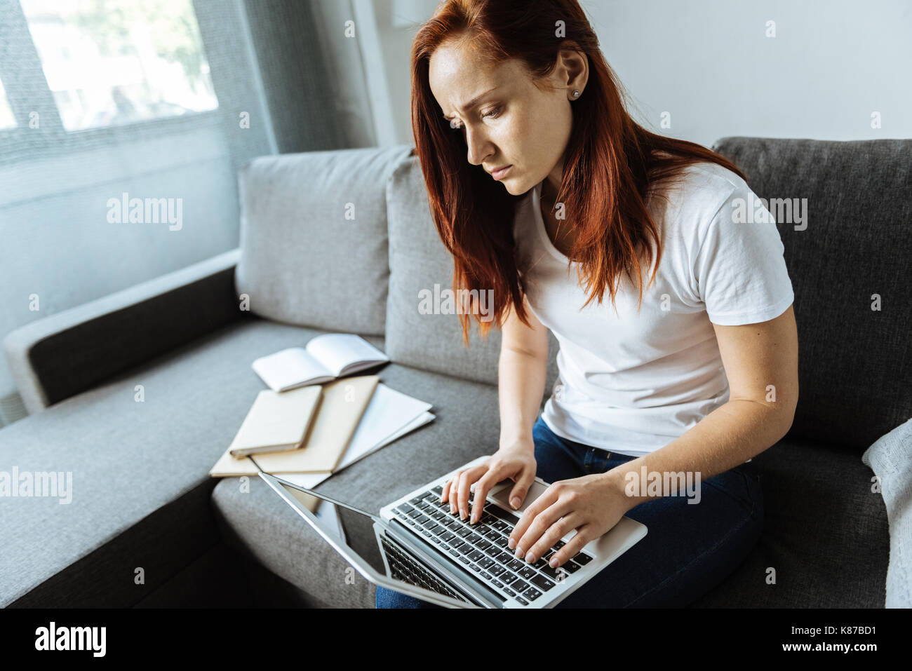 Stressed woman working laptop typing hi-res stock photography and ...