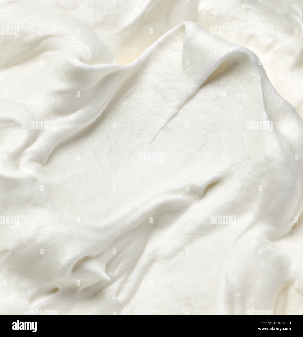 close up of a whipped cream on white background isolated Stock Photo ...