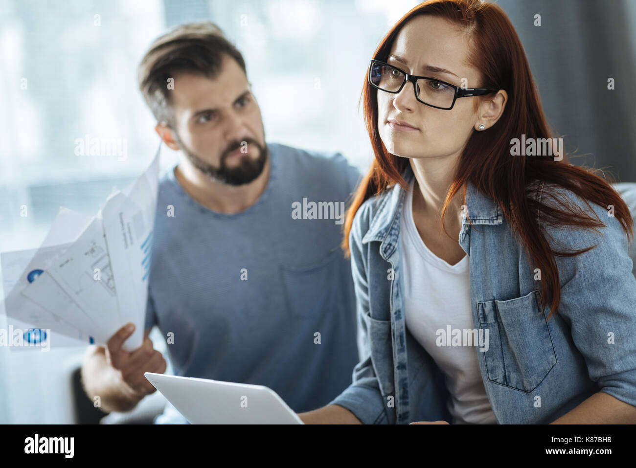 Smart unhappy woman feeling guilty Stock Photo - Alamy