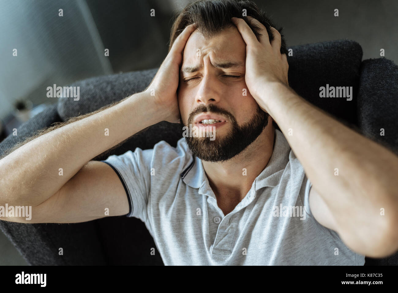 Cheerless desperate man suffering Stock Photo - Alamy