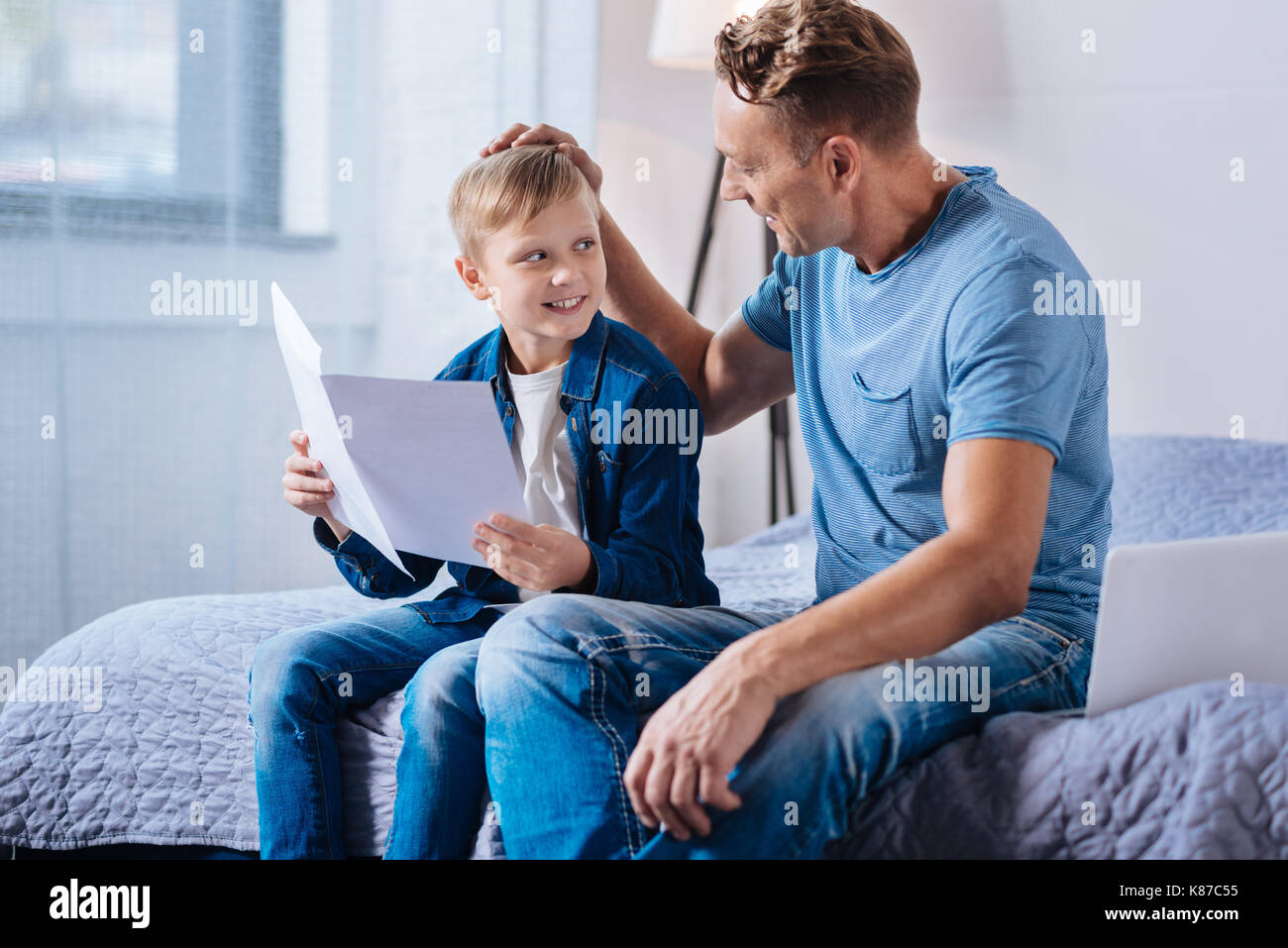 Patting head hi-res stock photography and images - Alamy