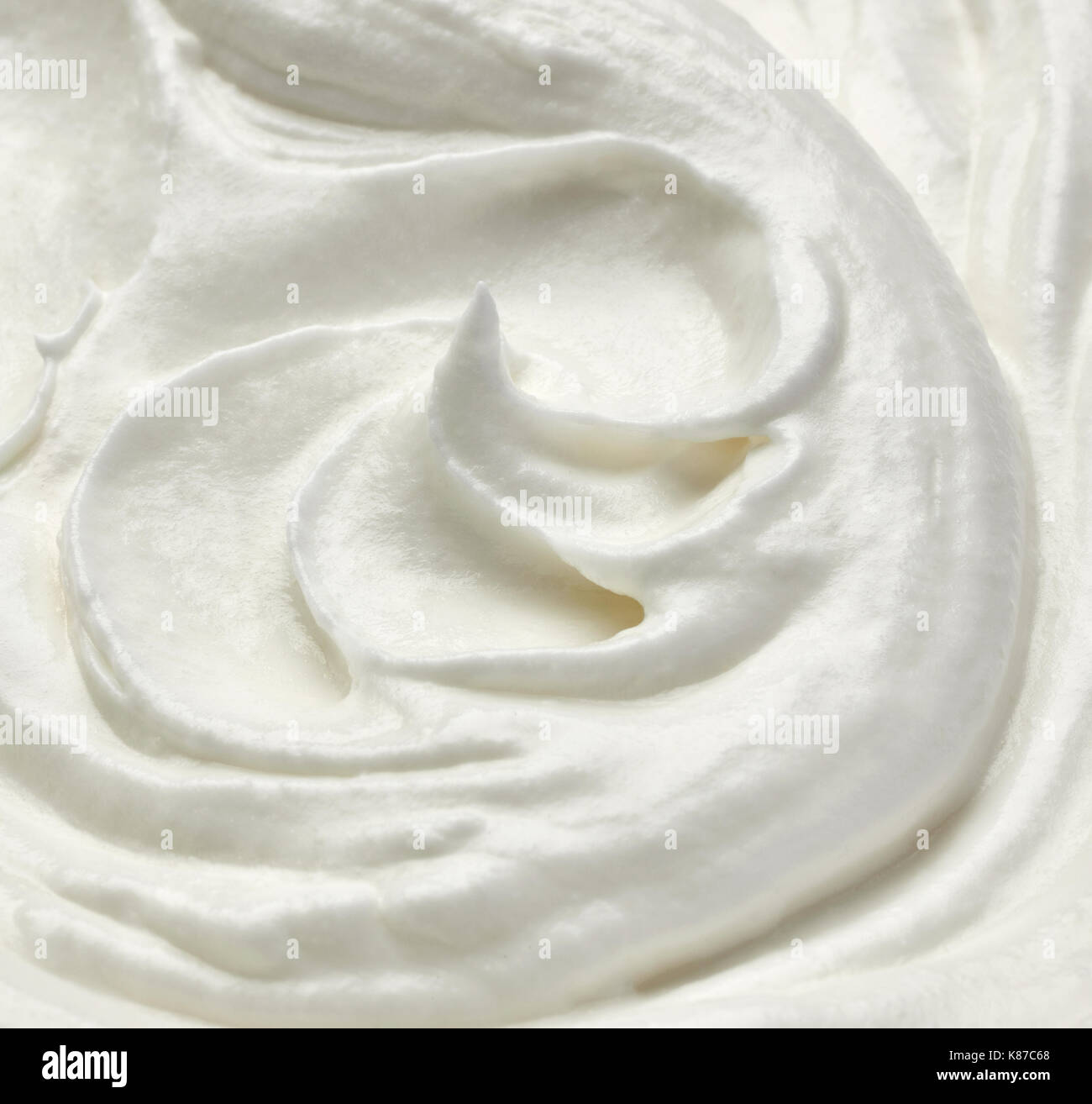 close up of a whipped cream on white background isolated Stock Photo ...
