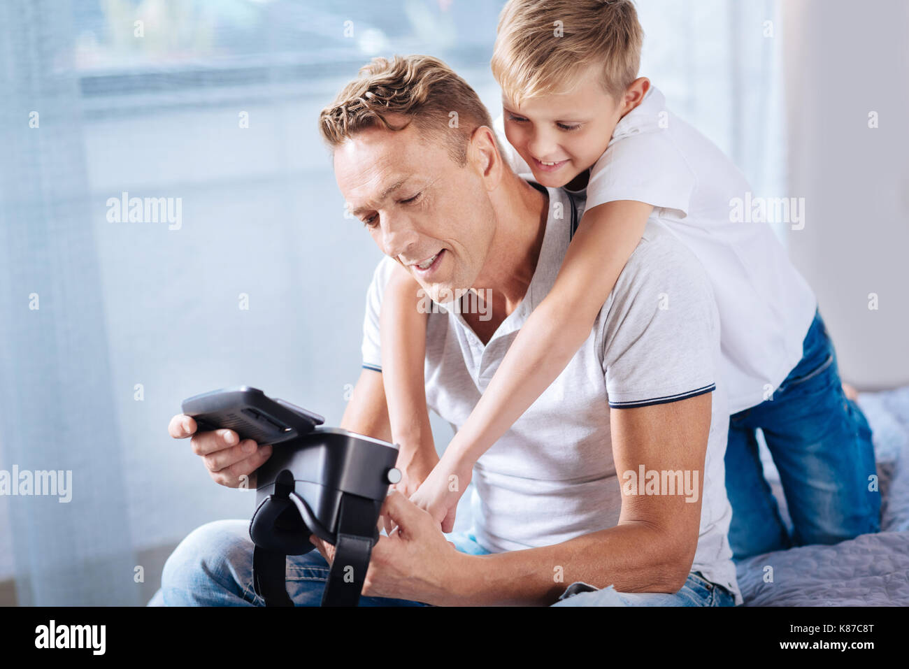 Upbringing cuddling hi-res stock photography and images - Alamy