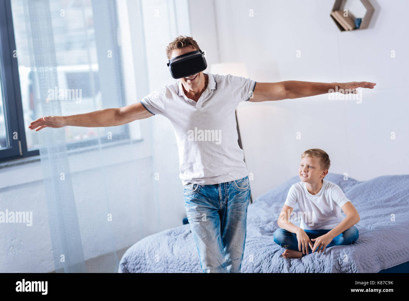 Child imitating parent hi-res stock photography and images - Alamy
