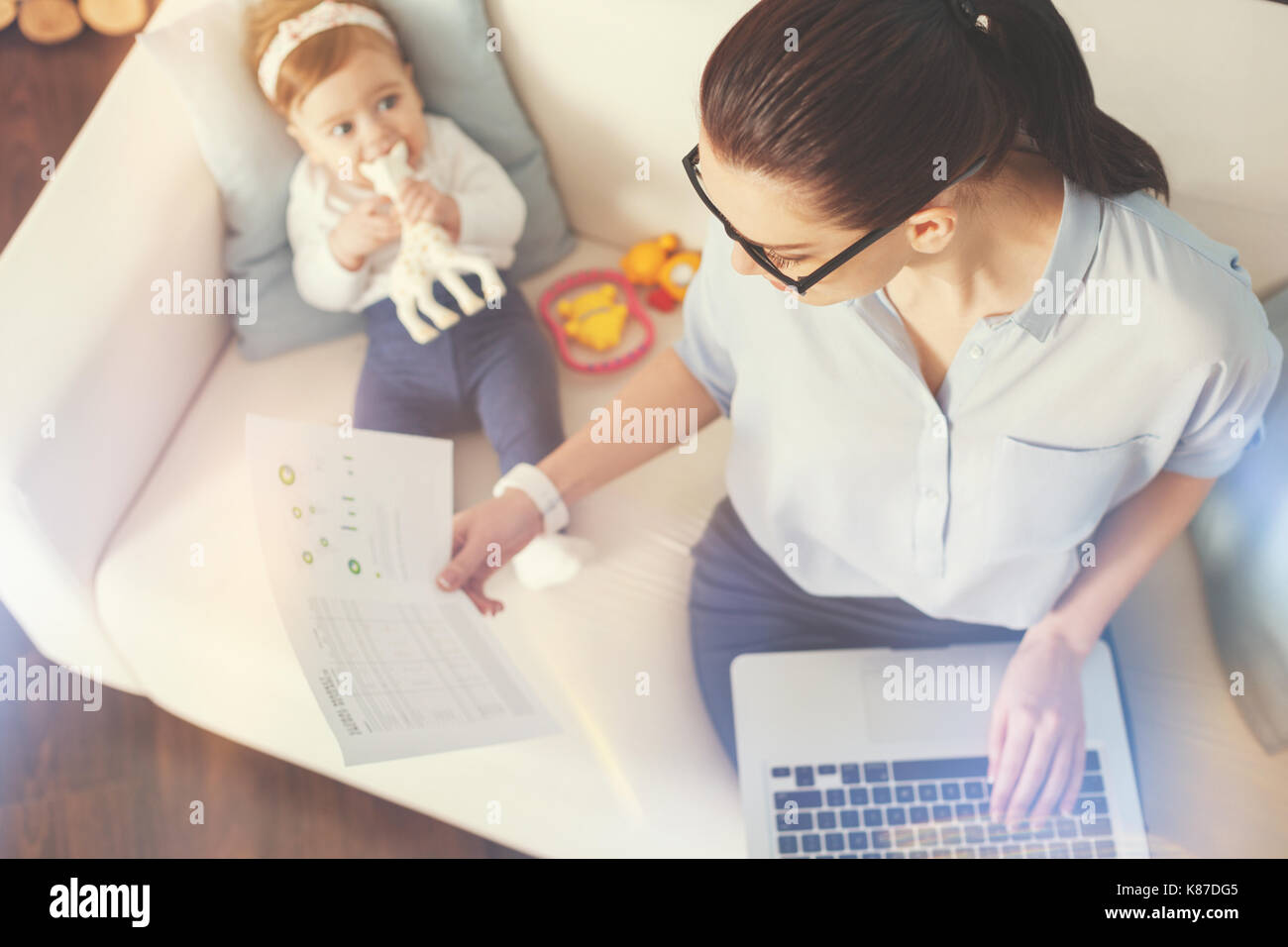 Top view picture of busy mum and her daughter Stock Photo - Alamy