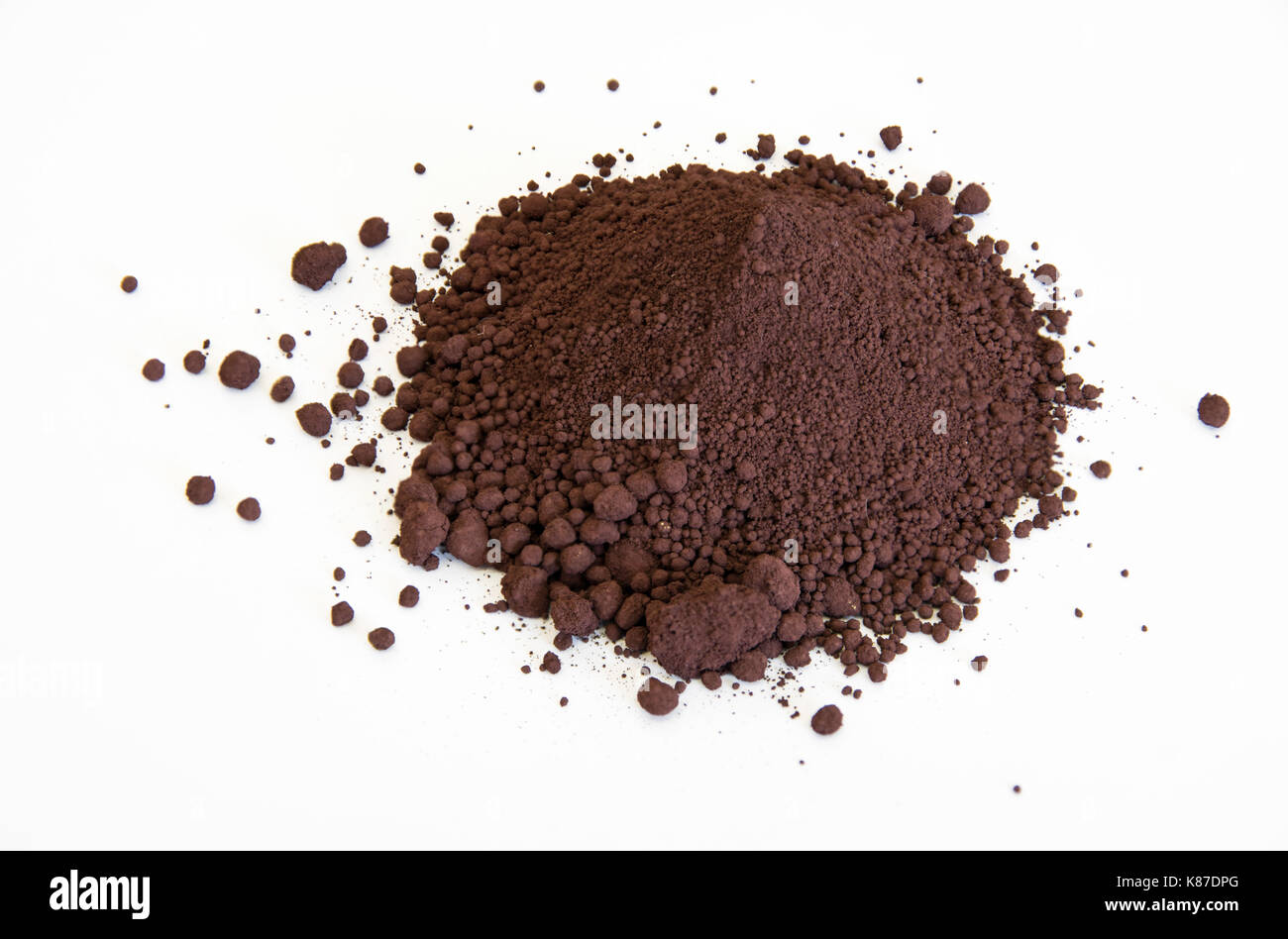 extreme close up of brown pigment isolated over white background Stock ...