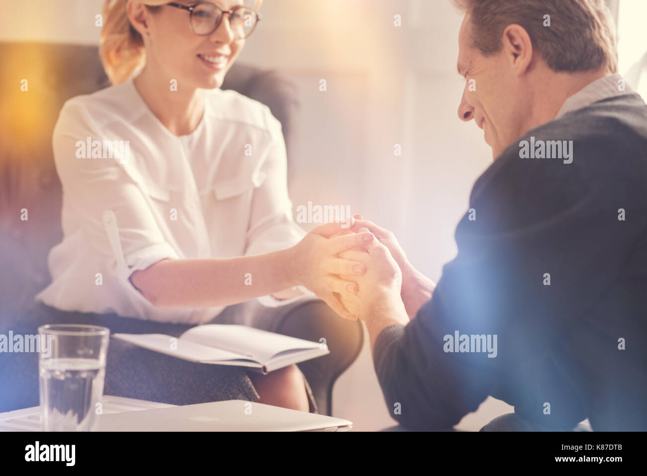 Joyful positive man smiling Stock Photo - Alamy Joyful positive man smiling Stock Photo - Alamy