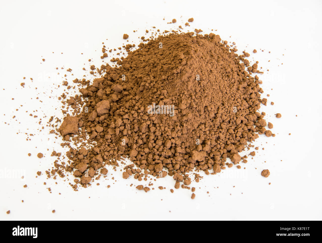 extreme close up of umber pigment isolated over white background Stock ...