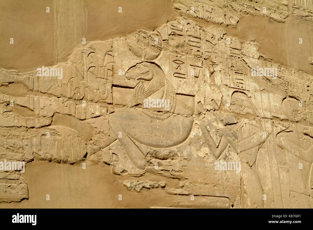 Ancient Bas-relief on the wall - God with sheep head, without people ...