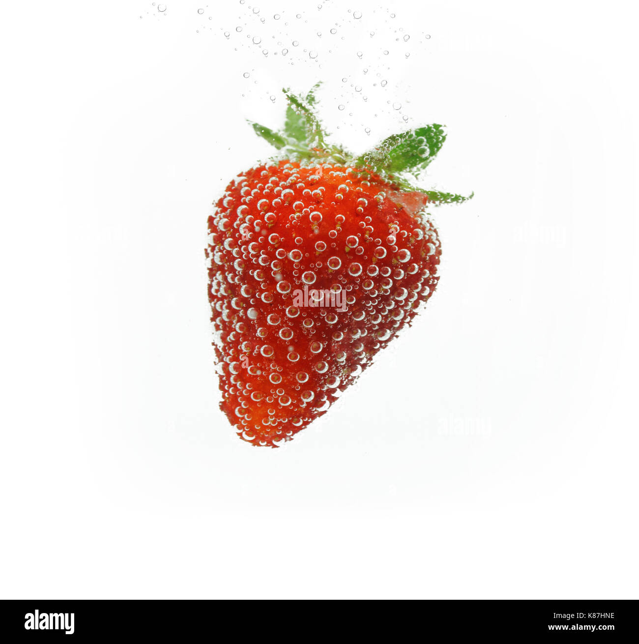 Strawberry in water Stock Photo - Alamy