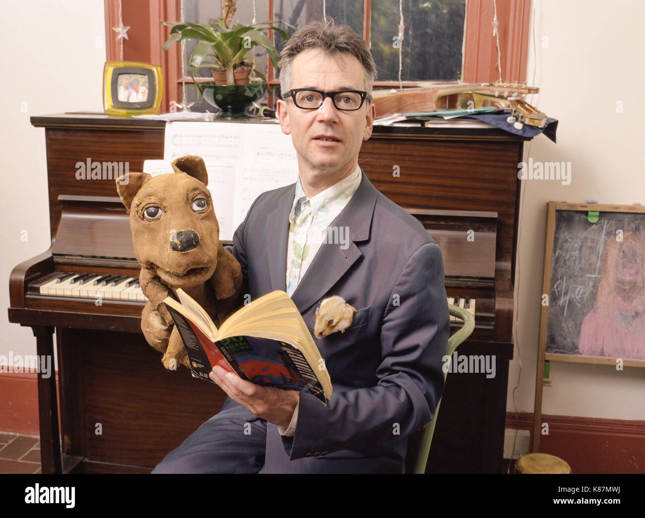 John Hegley , English performance poet, author, comedian, musician and ...
