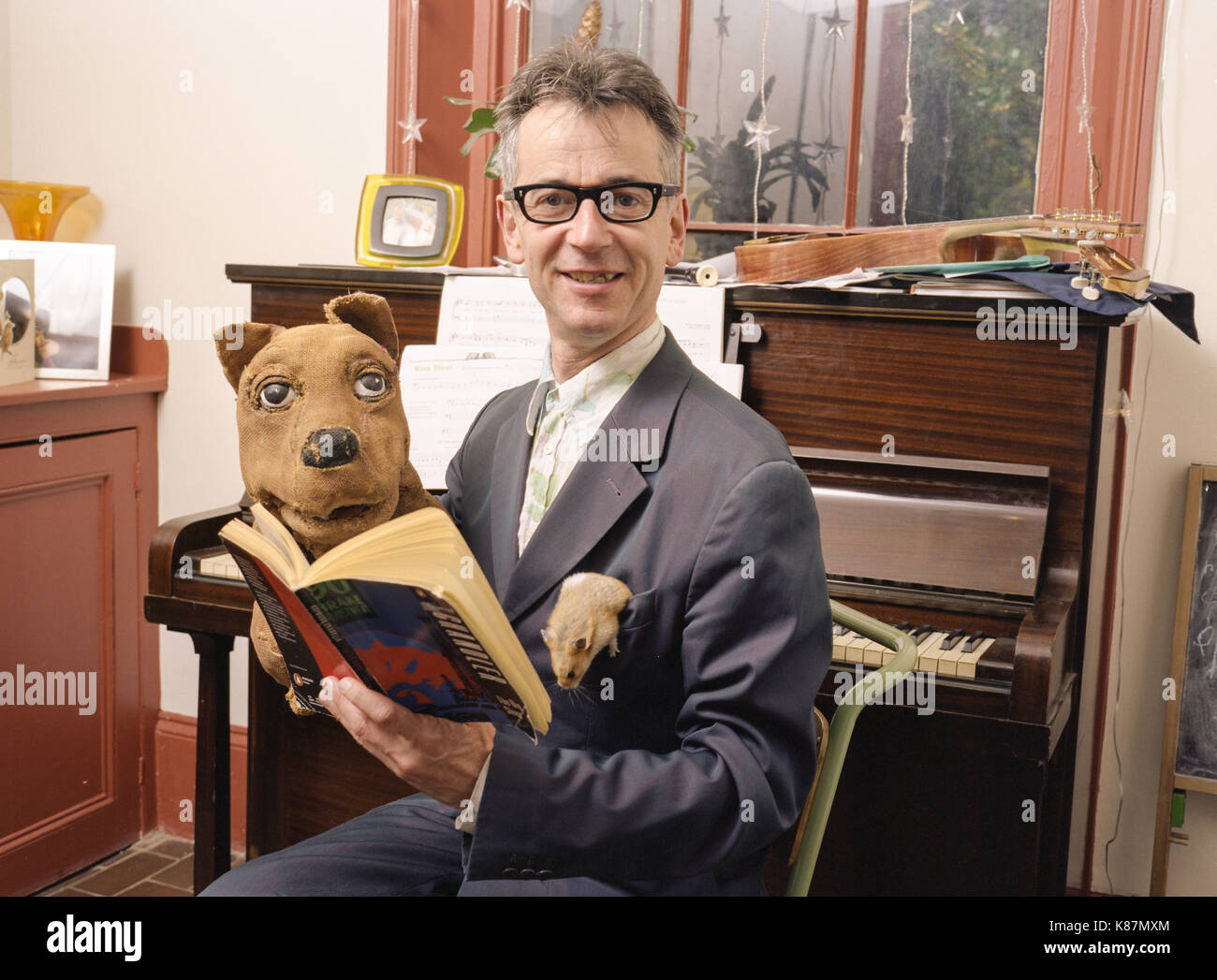 John Hegley , English performance poet, author, comedian, musician and ...