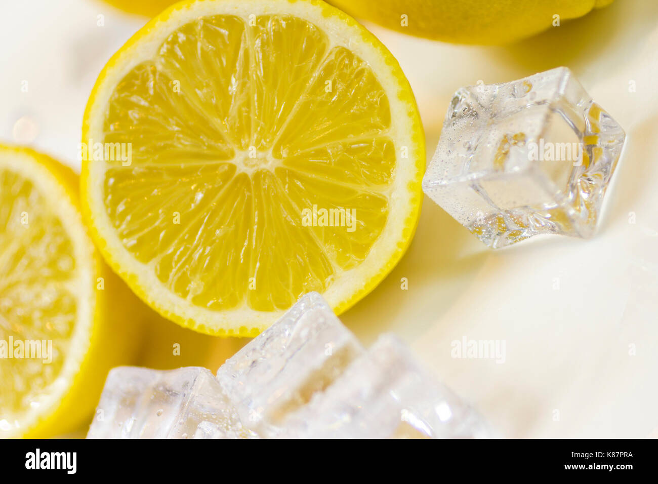 Lemon with ice cubes in a bowl Stock Photo - Alamy