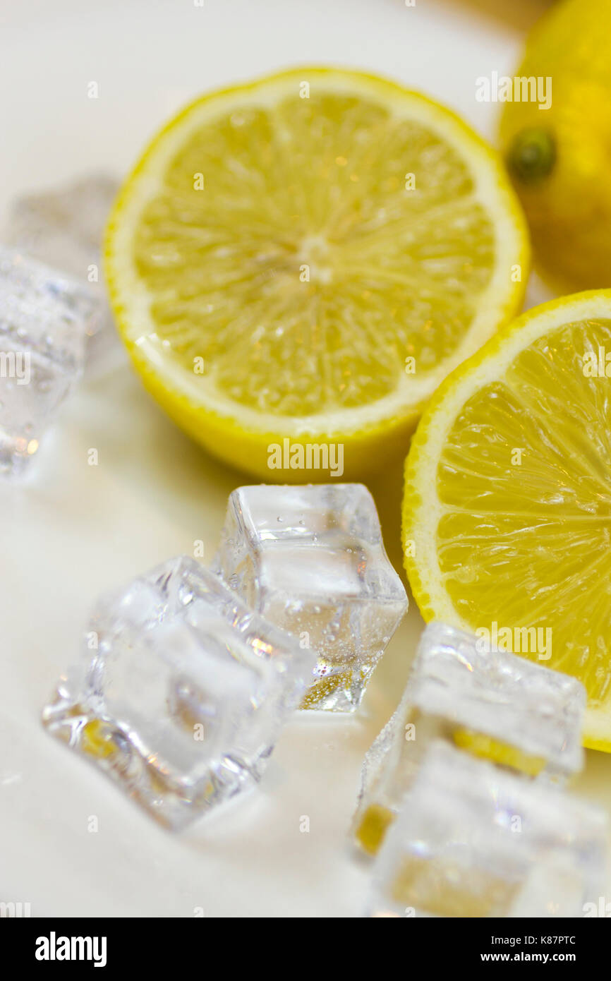 Lemon with ice cubes in a bowl Stock Photo - Alamy