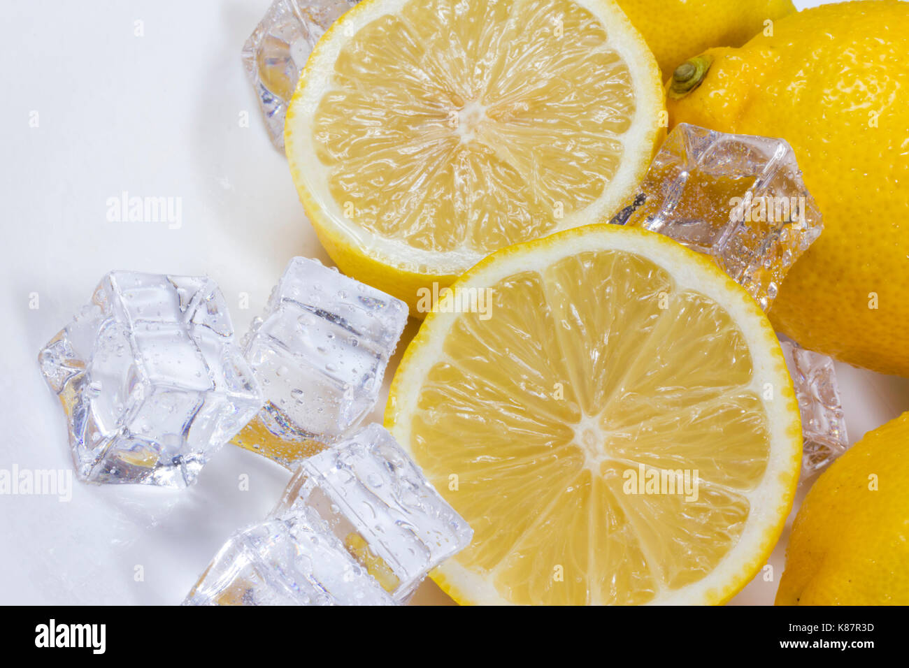 Lemon with ice cubes in a bowl Stock Photo - Alamy