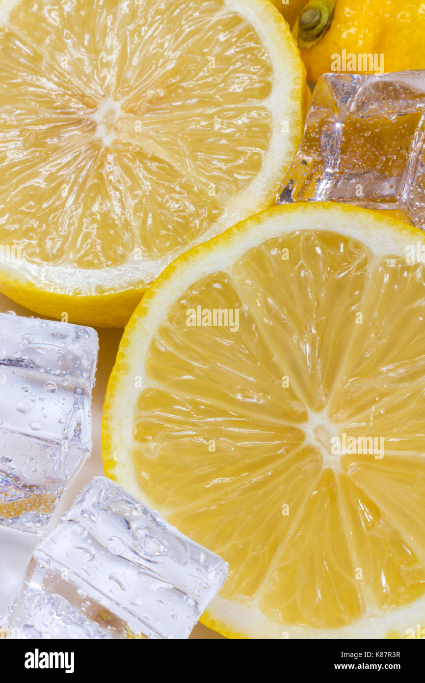Lemon with ice cubes in a bowl Stock Photo - Alamy