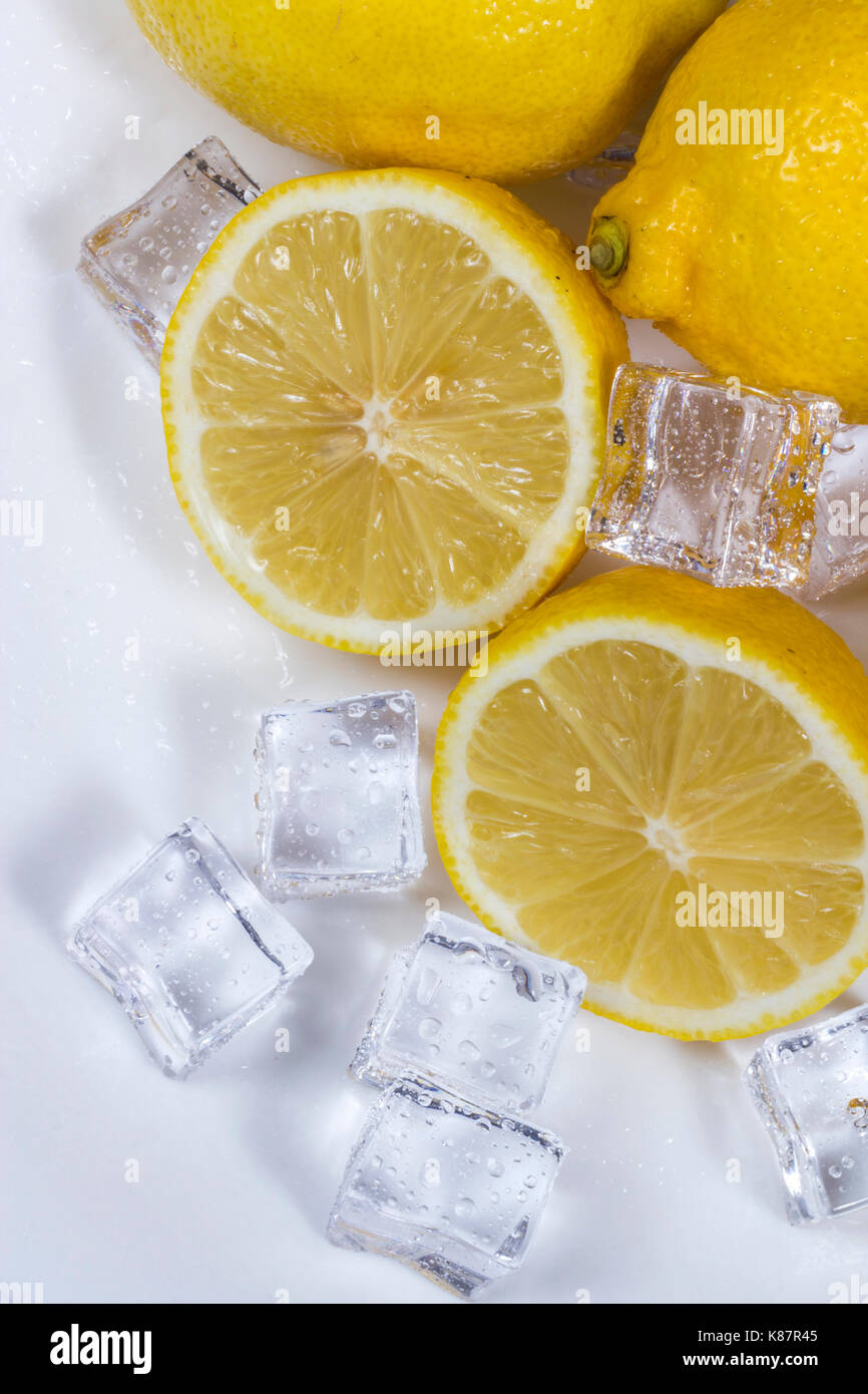 Lemon with ice cubes in a bowl Stock Photo - Alamy