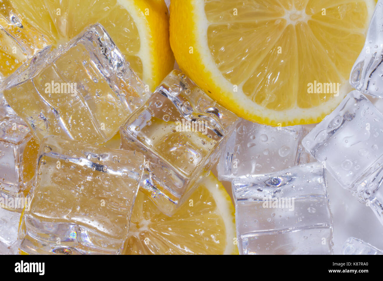 Lemon with ice cubes in a bowl Stock Photo - Alamy