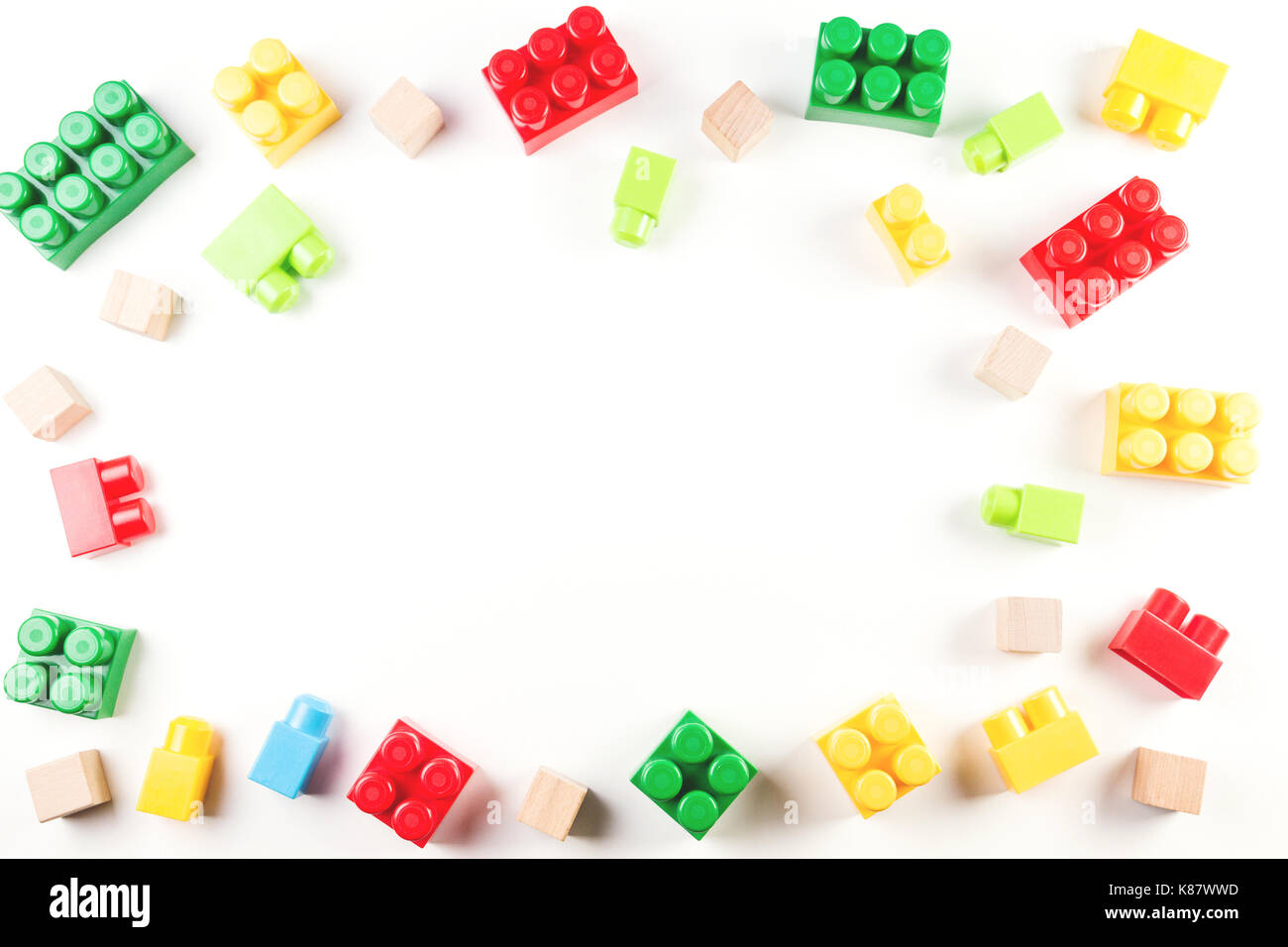 Toys background. Colorful wooden cubes and plastic construction blocks ...