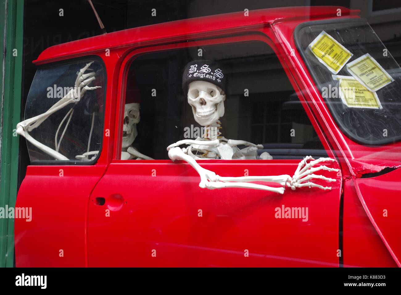Skeletons in a Red Car Mock Up in a Tattoo Parlour Window. City of Bath ...
