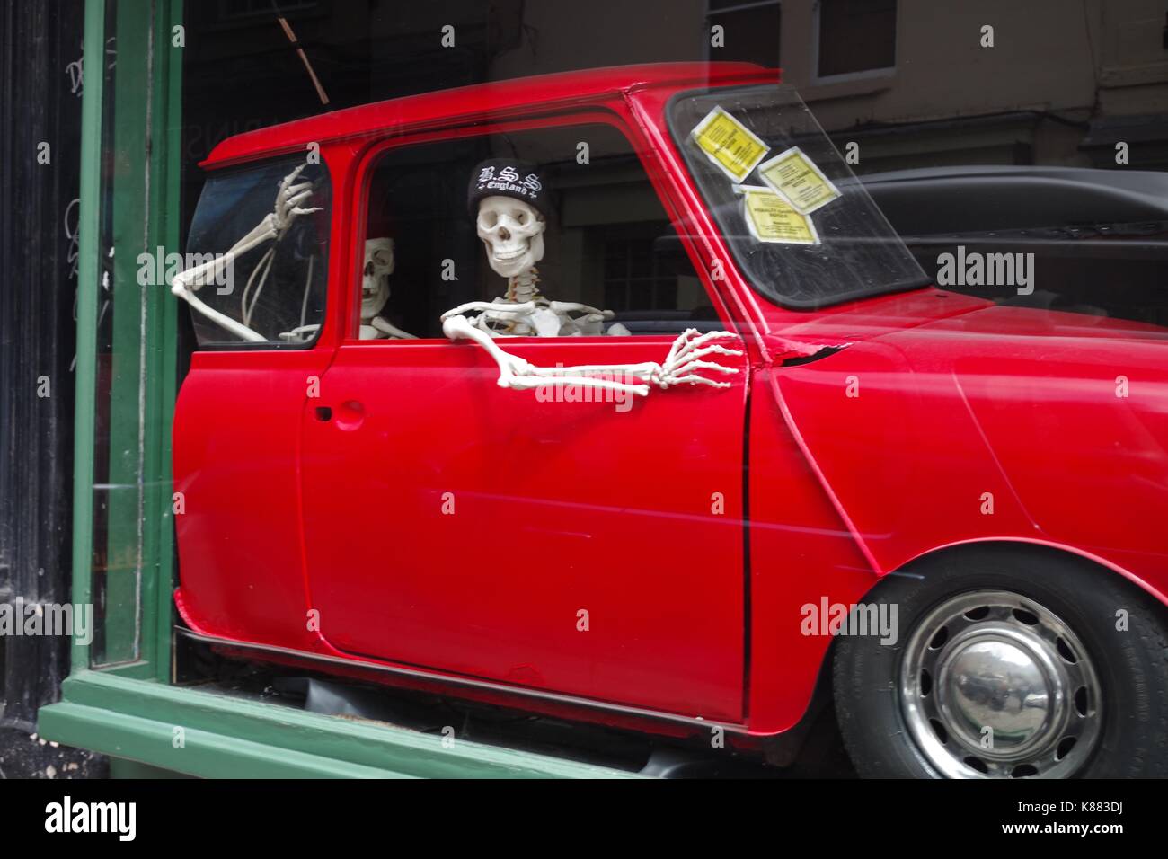 Skeletons in a Red Car Mock Up in a Tattoo Parlour Window. City of Bath ...
