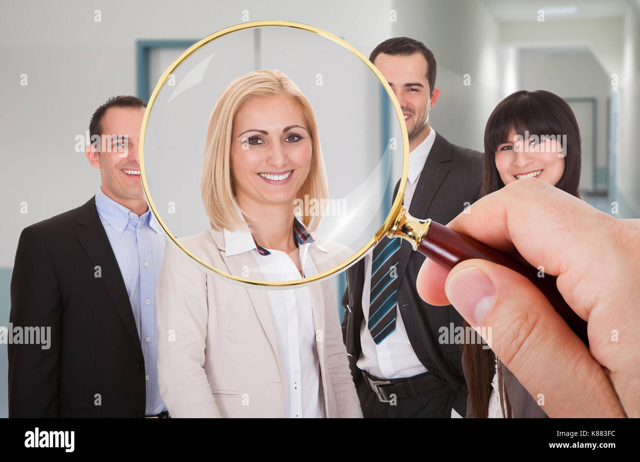 Person Hand With Magnifying Glass Looking At Candidate Stock Photo - Alamy