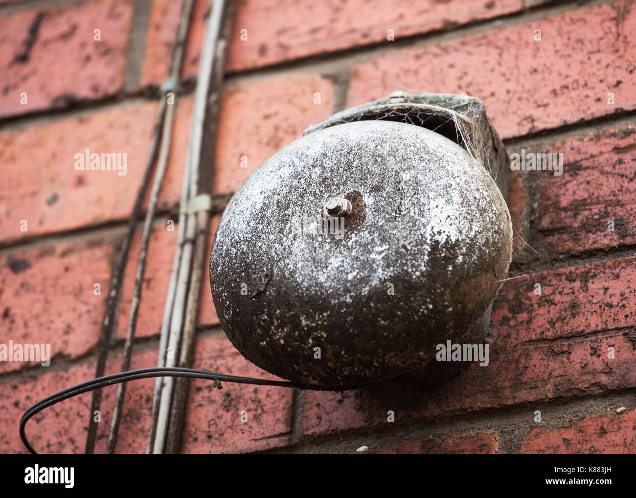 Old rusted bell on building Stock Photo - Alamy