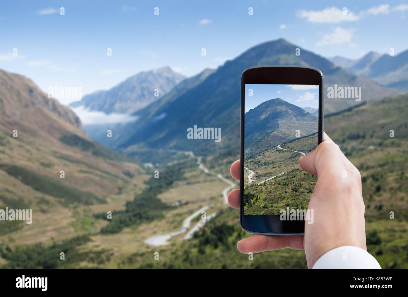 Hand holding phone landscape hi-res stock photography and images - Alamy