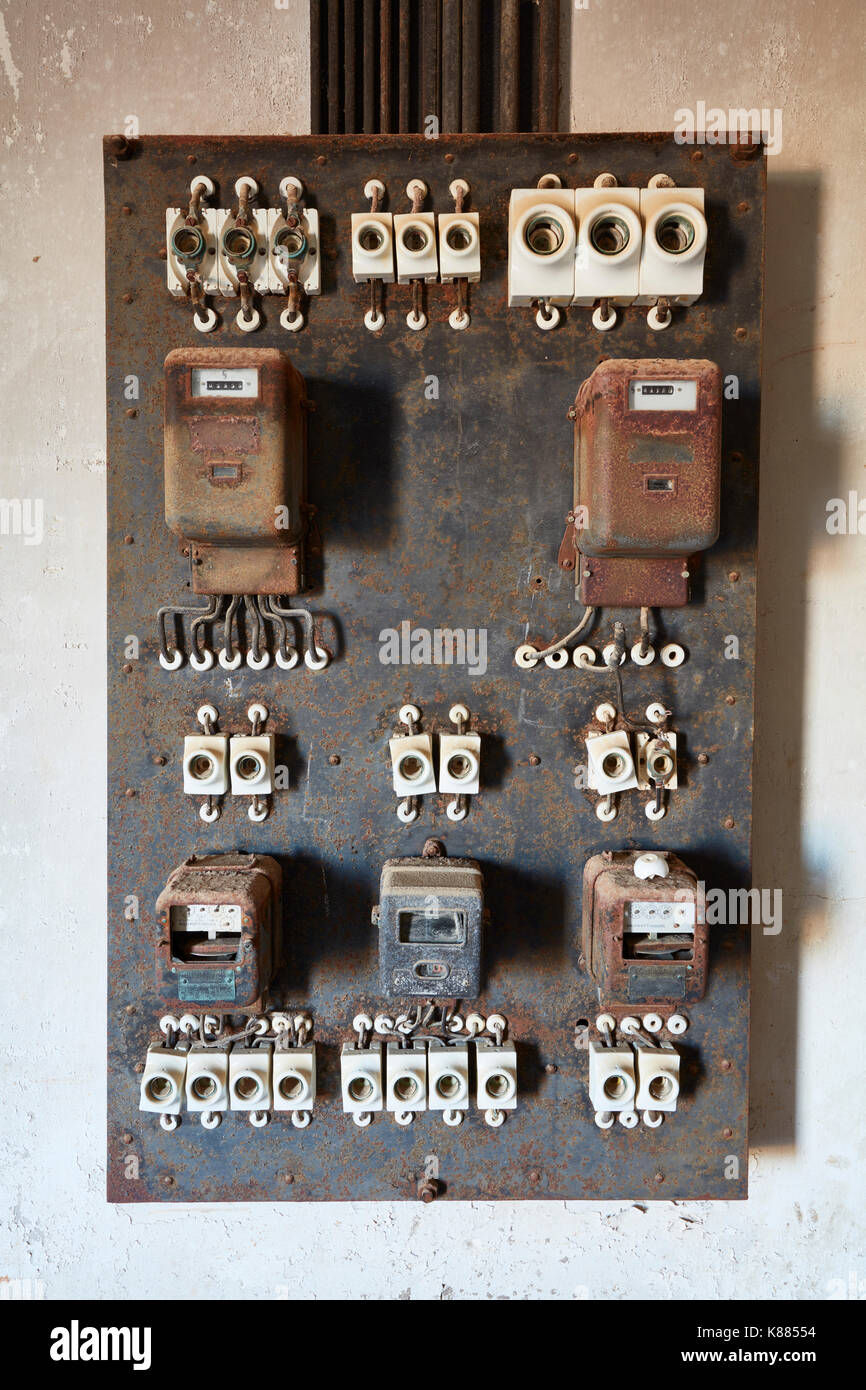 An outdated circuit board in an abandoned derelict building Stock Photo ...