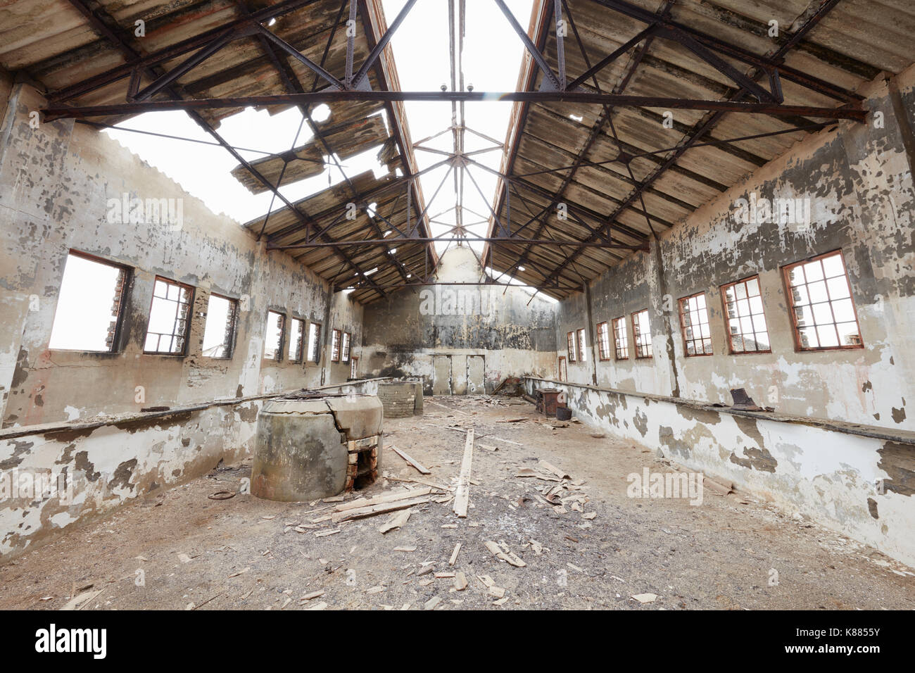 Interior of an old large derelict building in a deserted diamond miming ...