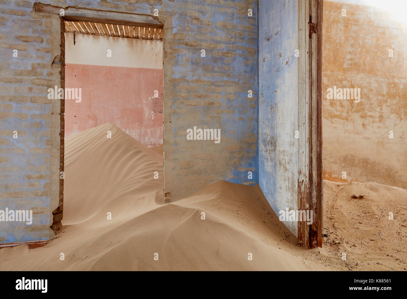 Interior of an abandoned building full of sand Stock Photo - Alamy