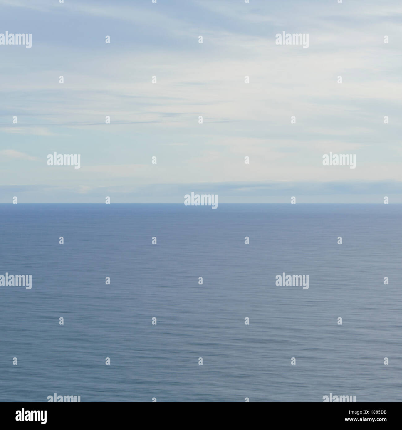 View from the land over the ocean at dawn, to the horizon where the sky ...