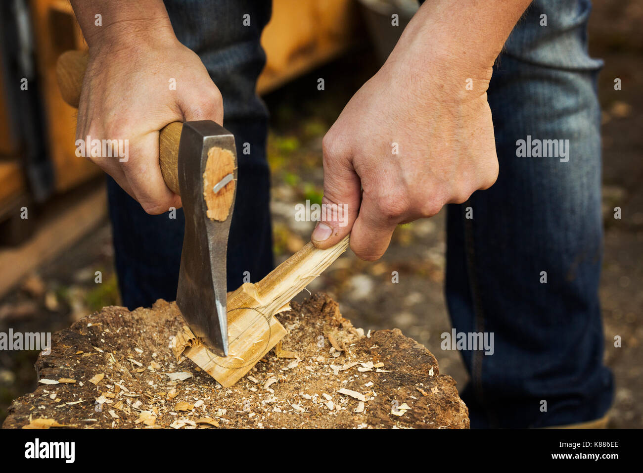Hand holding axe hi-res stock photography and images - Alamy