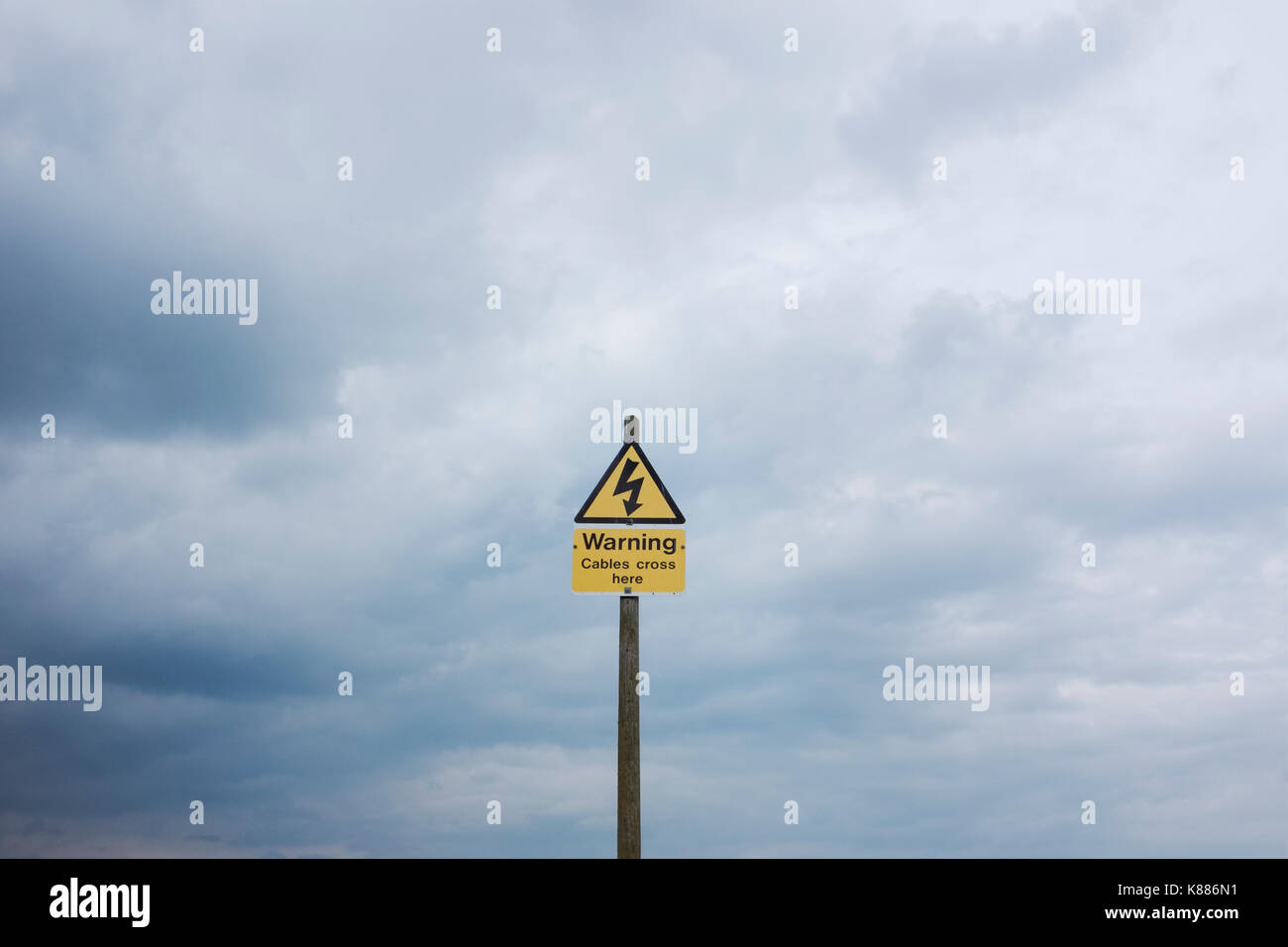 Yellow triangular warning sign hi-res stock photography and images - Alamy