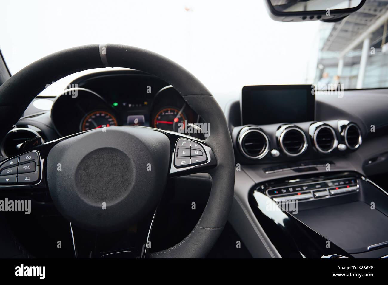 Control buttons on steering wheel. Car interior. Shallow dof Stock ...