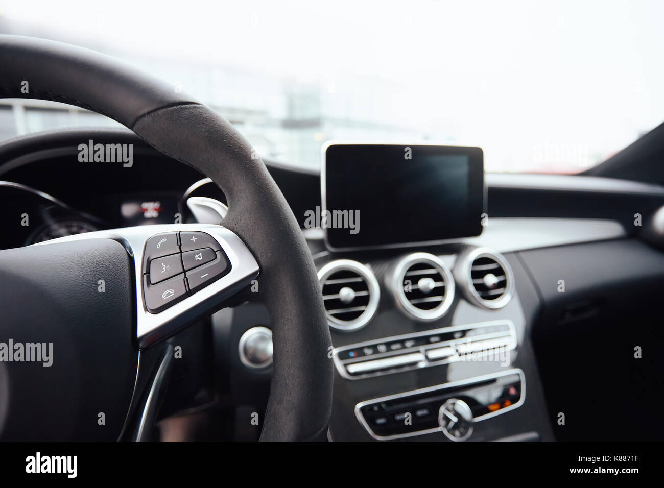 Control buttons on steering wheel. Car interior. Shallow dof Stock ...