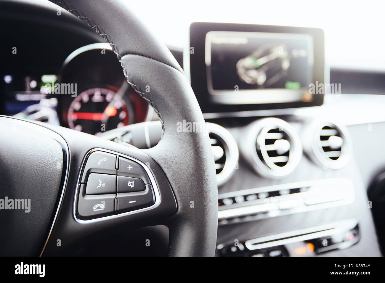 Control buttons on steering wheel. Car interior. Shallow dof Stock ...