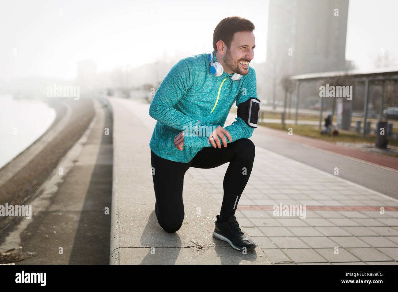 Runner training road hi-res stock photography and images - Alamy