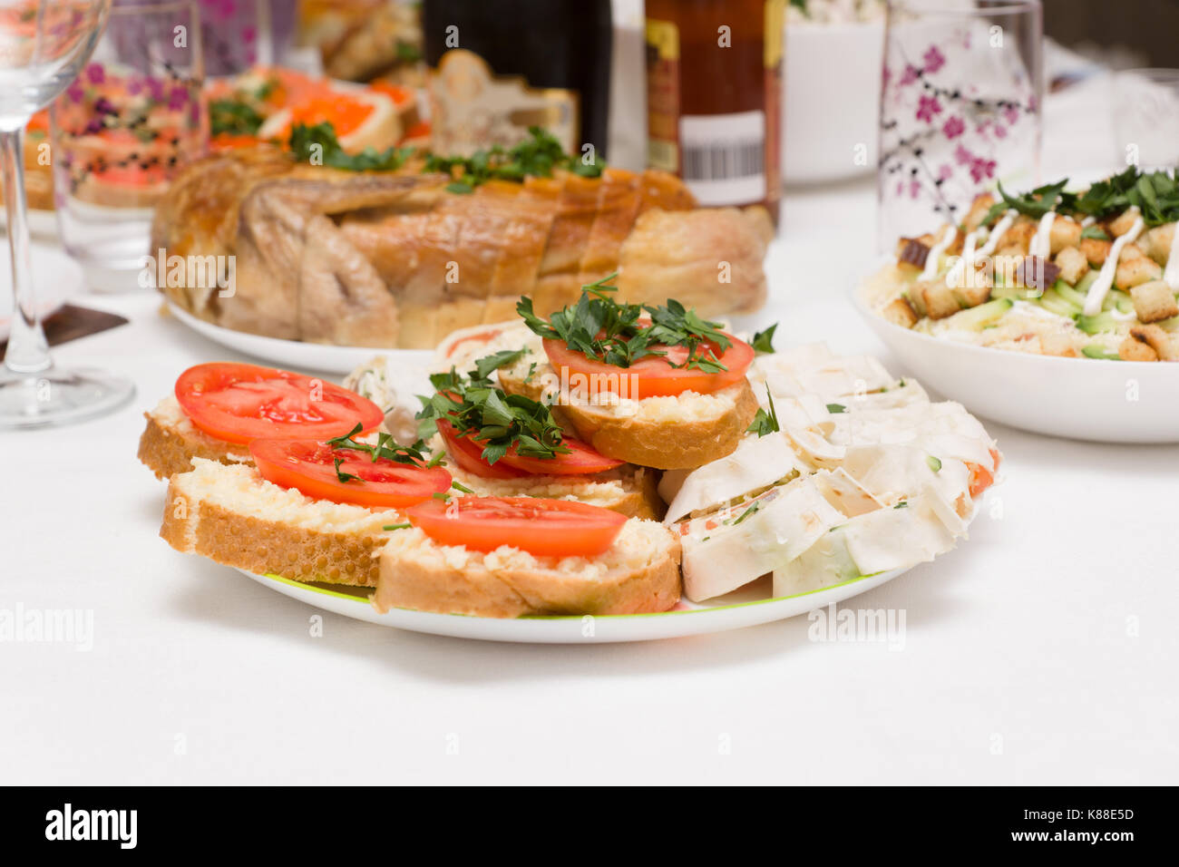delicious cold appetizers snack on a festive table Stock Photo - Alamy