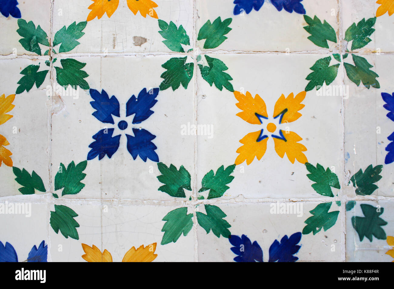 Chipped, hand-painted "azulejo" tiles decorating a building on the ...