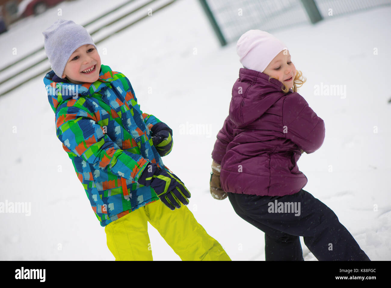 Children Throwing Snowballs