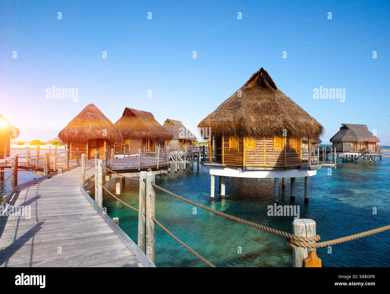 small houses on water in the ocean Stock Photo - Alamy