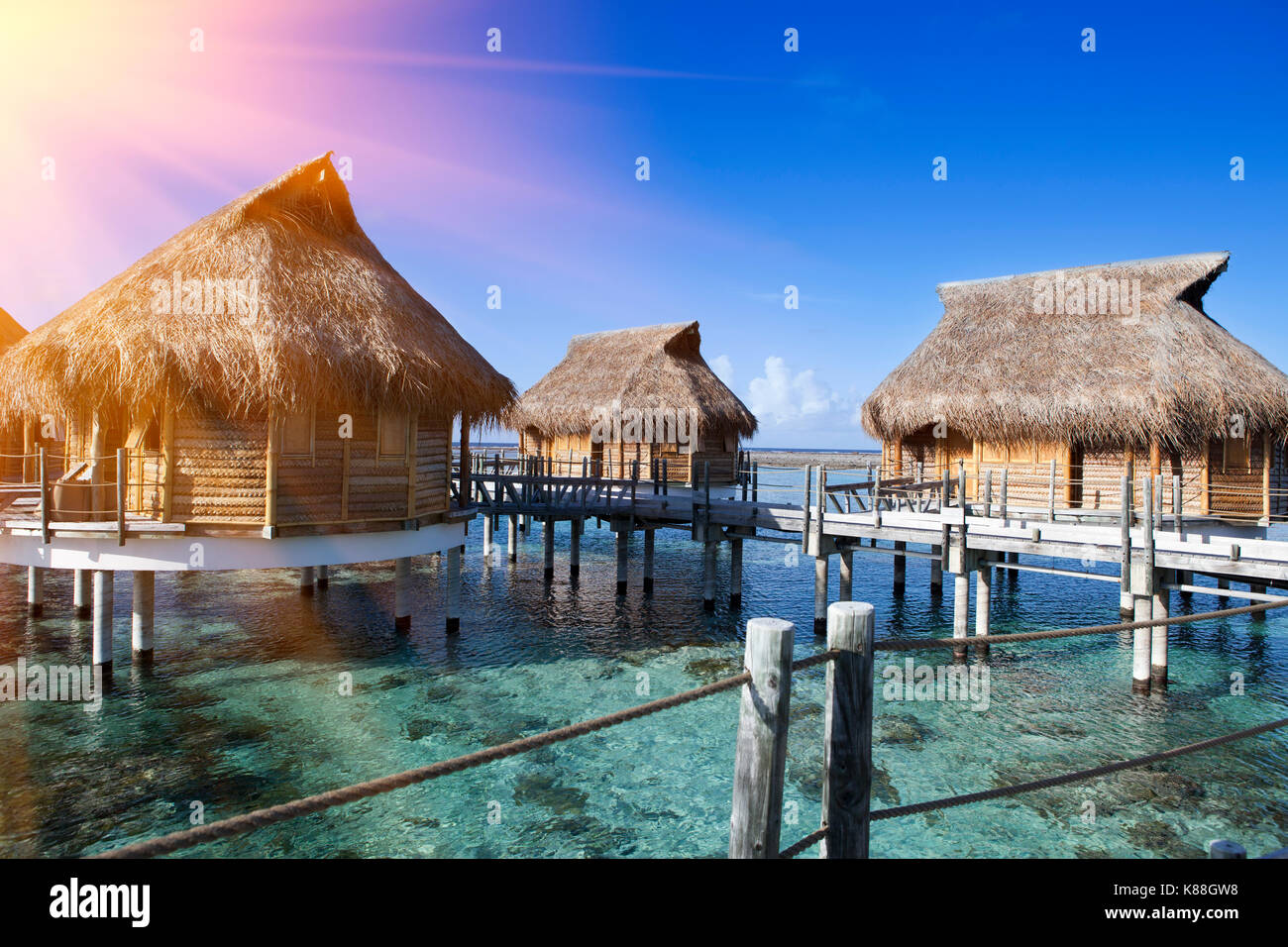small houses on water in the ocean Stock Photo - Alamy
