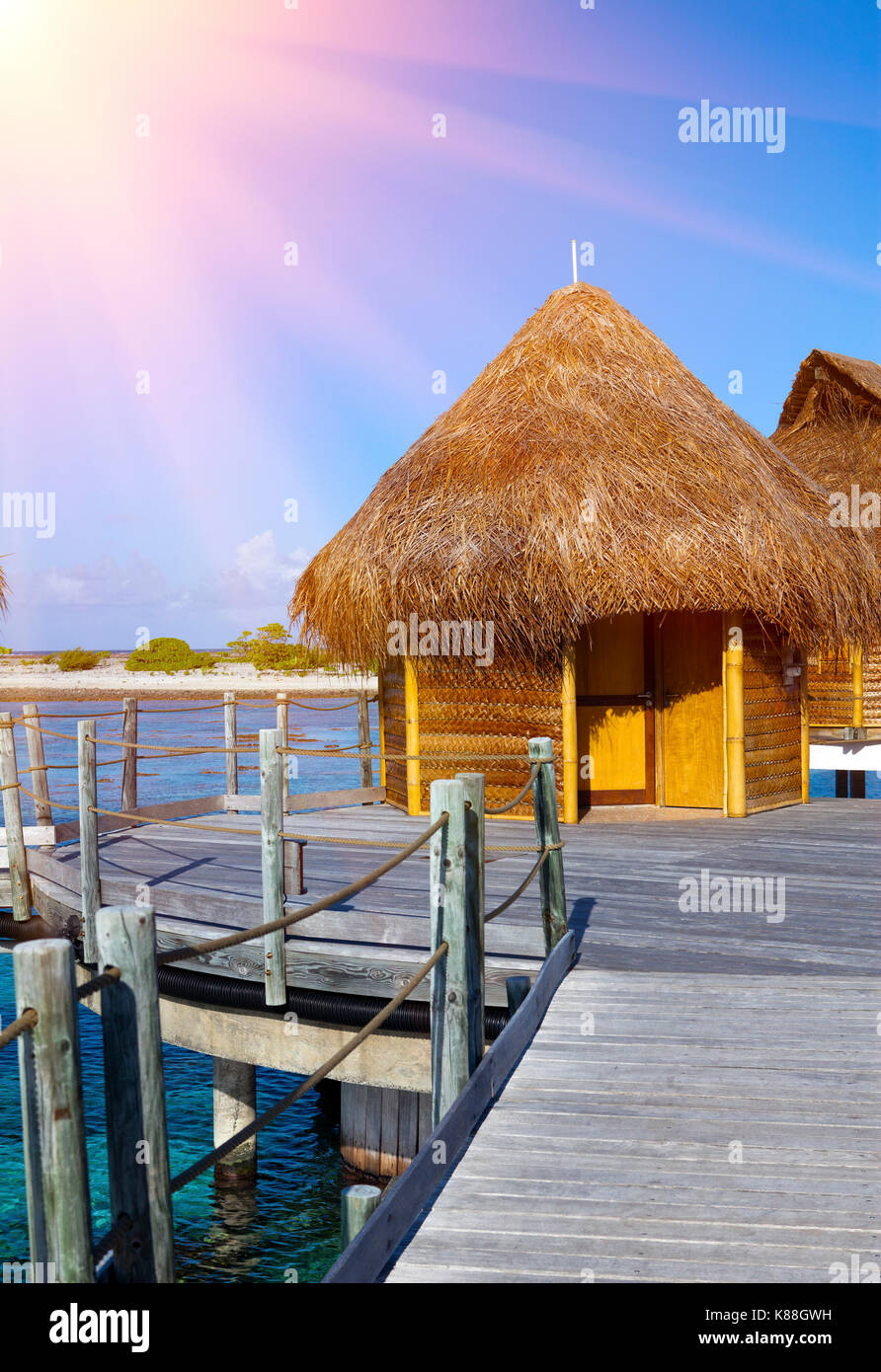 small houses on water in the ocean Stock Photo - Alamy