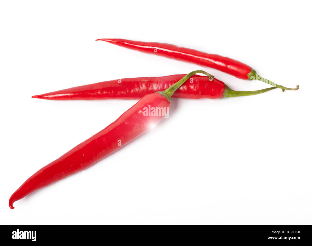 red chilli peppers on white background Stock Photo - Alamy