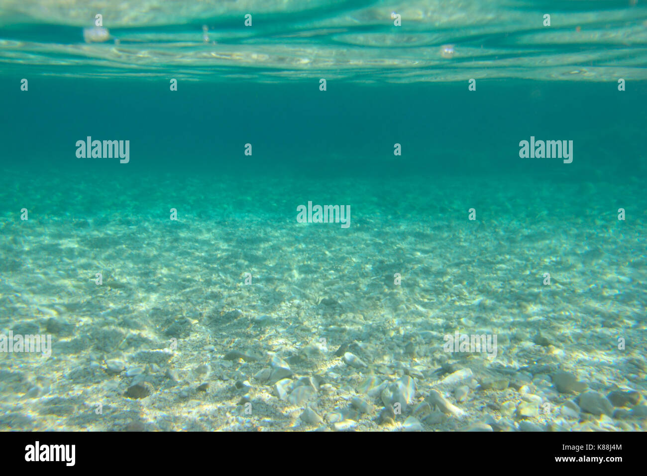 Underwater sea view background of transparent clear water, sea bottom ...