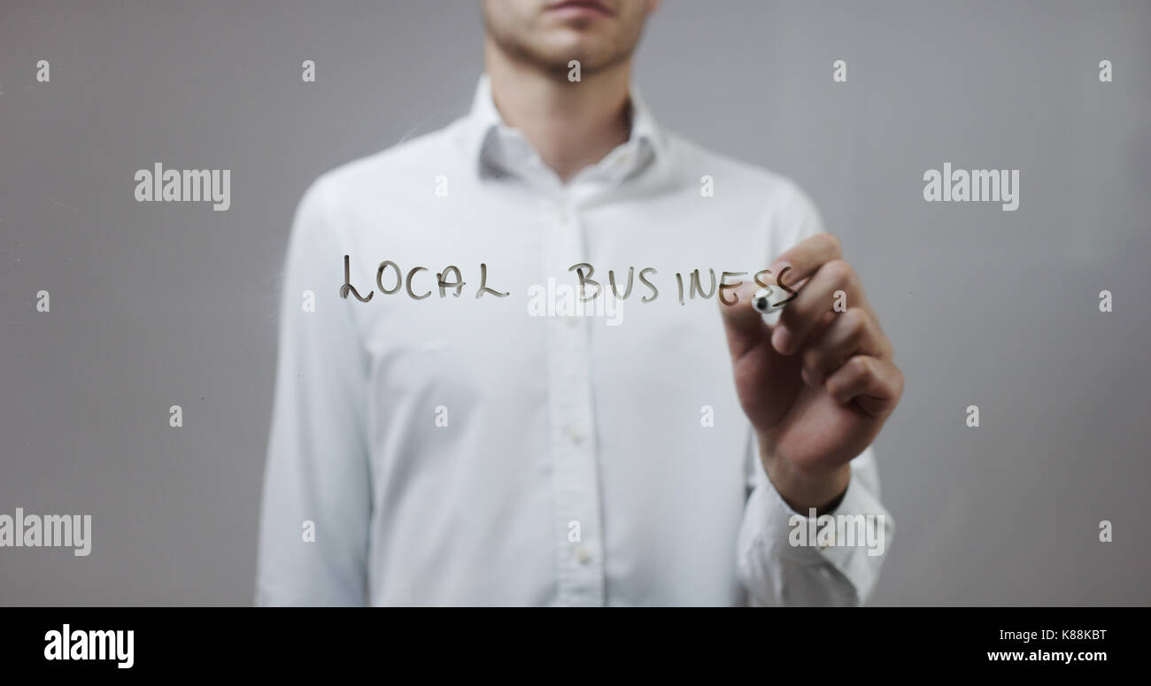 Local business man writing hi-res stock photography and images - Alamy