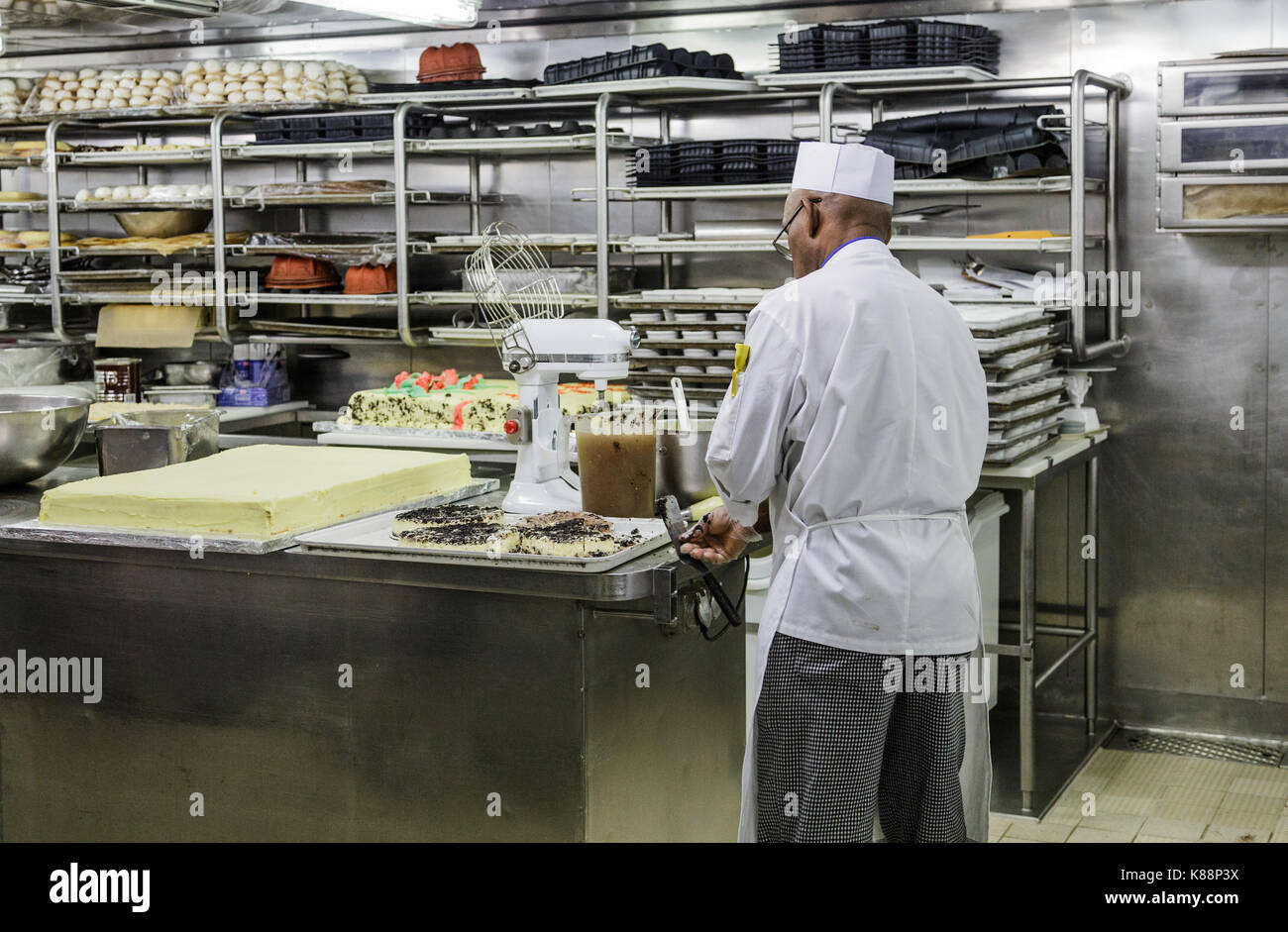 Pastry Chef Working in Commercial Kitchen Stock Photo - Alamy