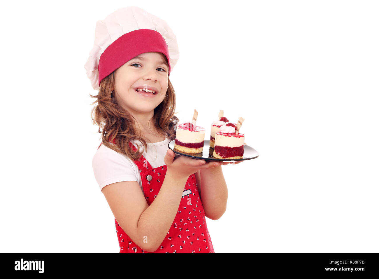 happy little girl cook with sweet raspberry cake Stock Photo - Alamy