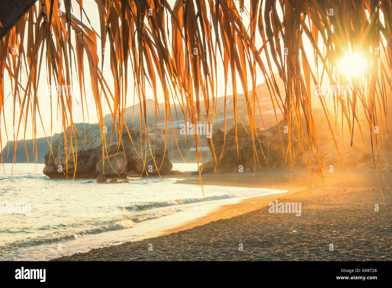 Summer view of a beach at sunset, Tertsa, Crete, Greece Stock Photo - Alamy